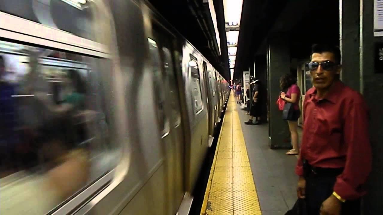 MTA New York City Subway Astoria-Ditmars Bound Siemens R160B (N) Train Departing Lexington/59 St ...
