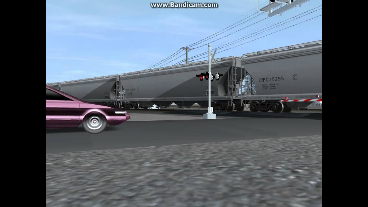 Trainz Simulator 12 - BN SD60M leads Freight Train through Main Street ...