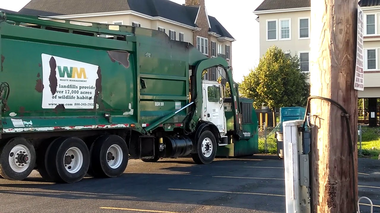 Wm mcneilus top loading truck - YouTube