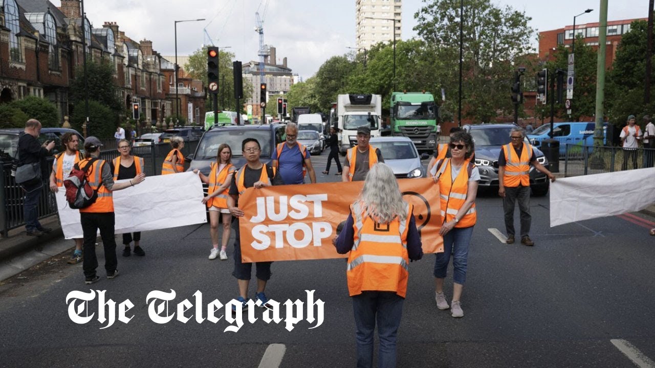 Commuter rips banners out of just Stop Oil protesters' hands blocking ...