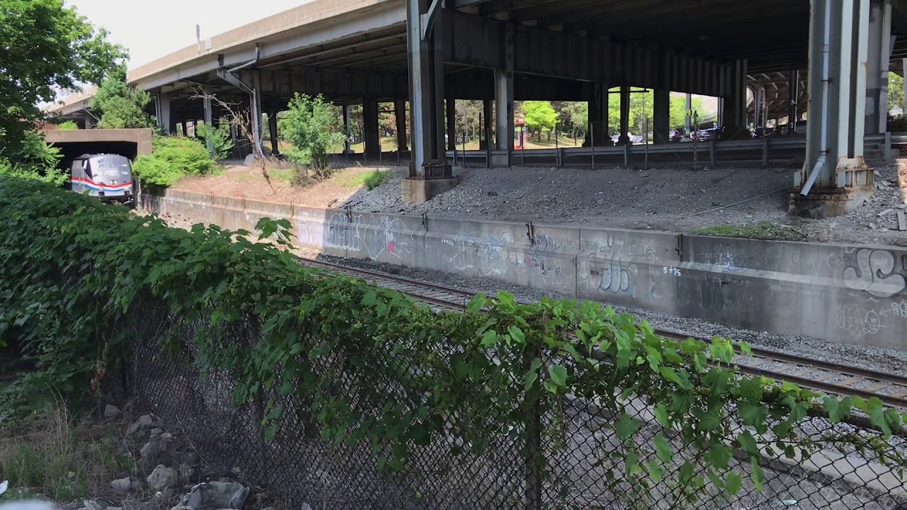 Amtrak 64 between tunnels downtown Buffalo. - YouTube