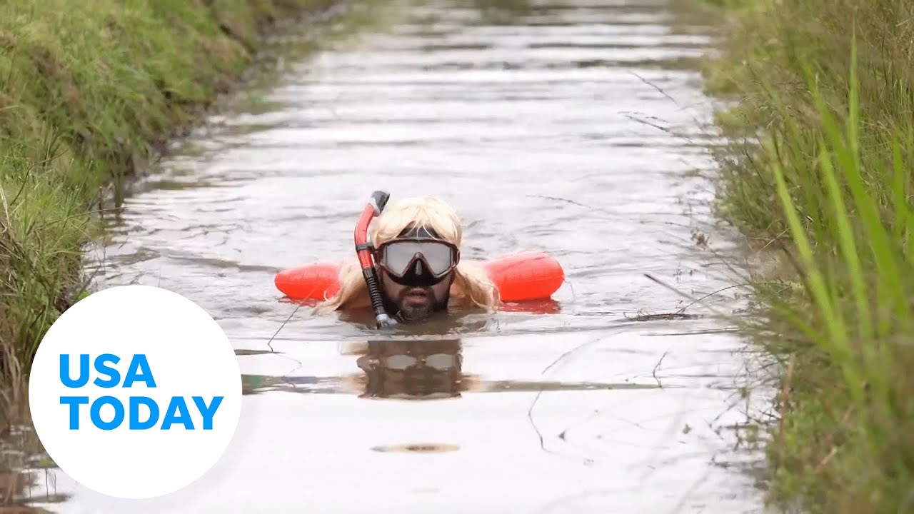 Competitors from around the globe compete in bog snorkeling in Wales ...