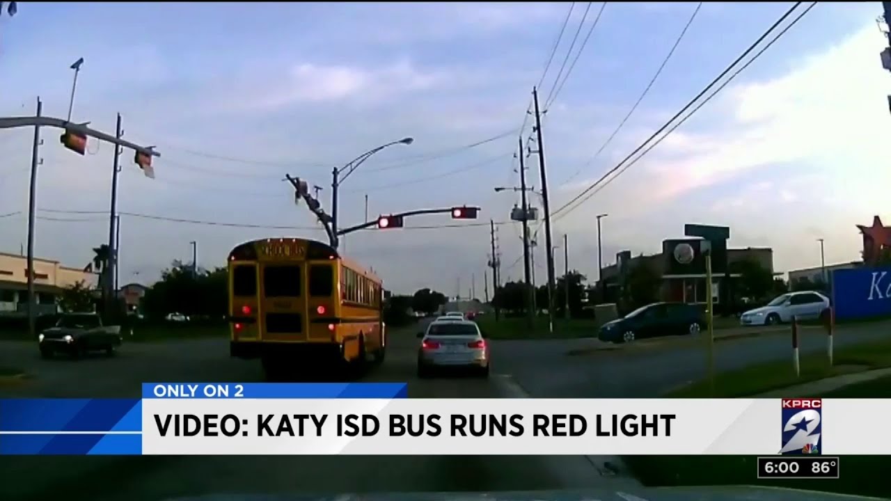 School bus runs red light - YouTube