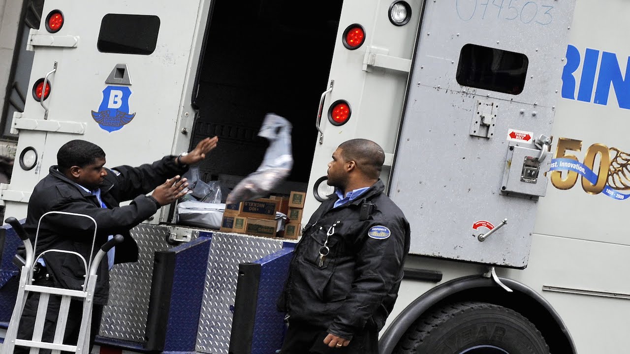 Fake Security Guard Walks Away With Bags Of Cash - YouTube