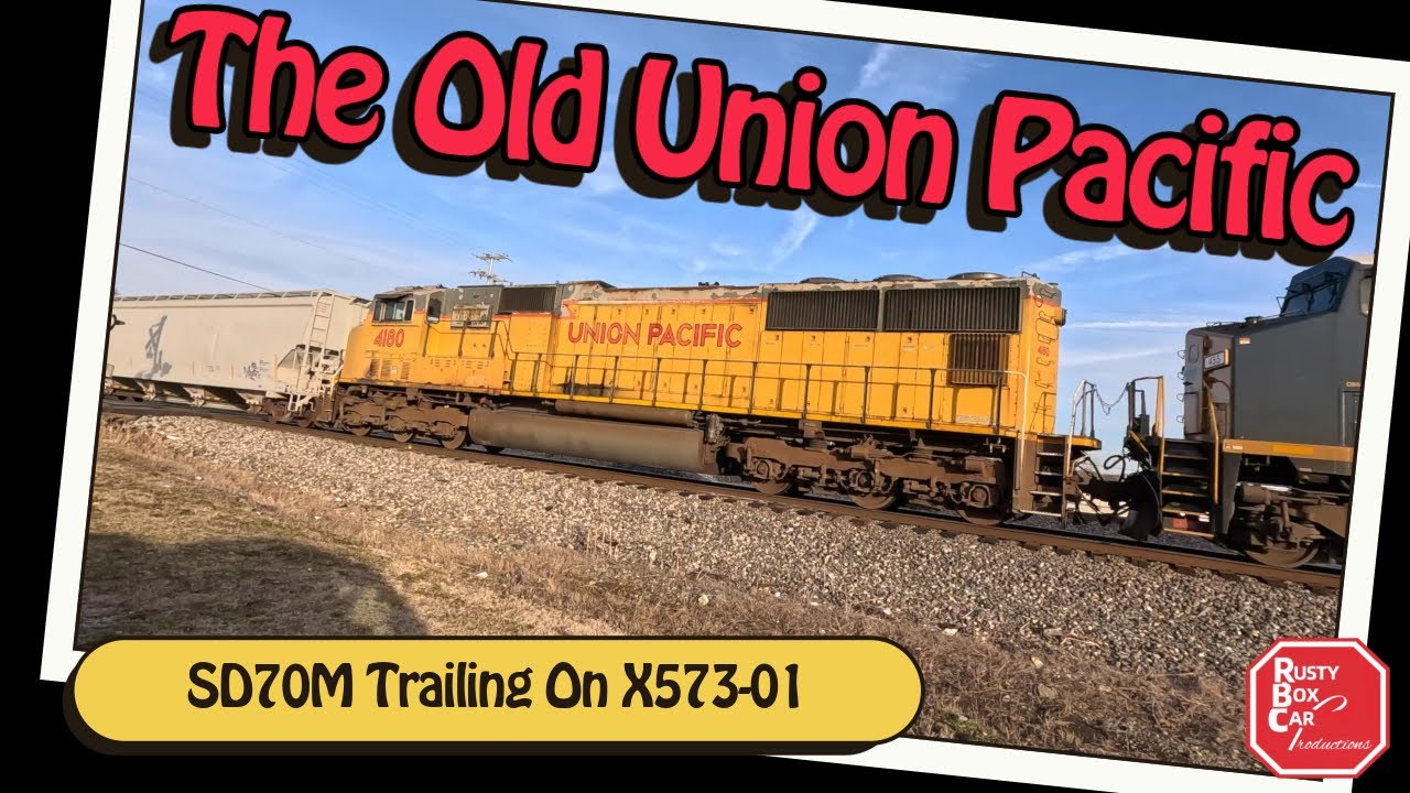 A Well Weathered Union Pacific SD70M Trailing on CSX Freight Train X573 ...
