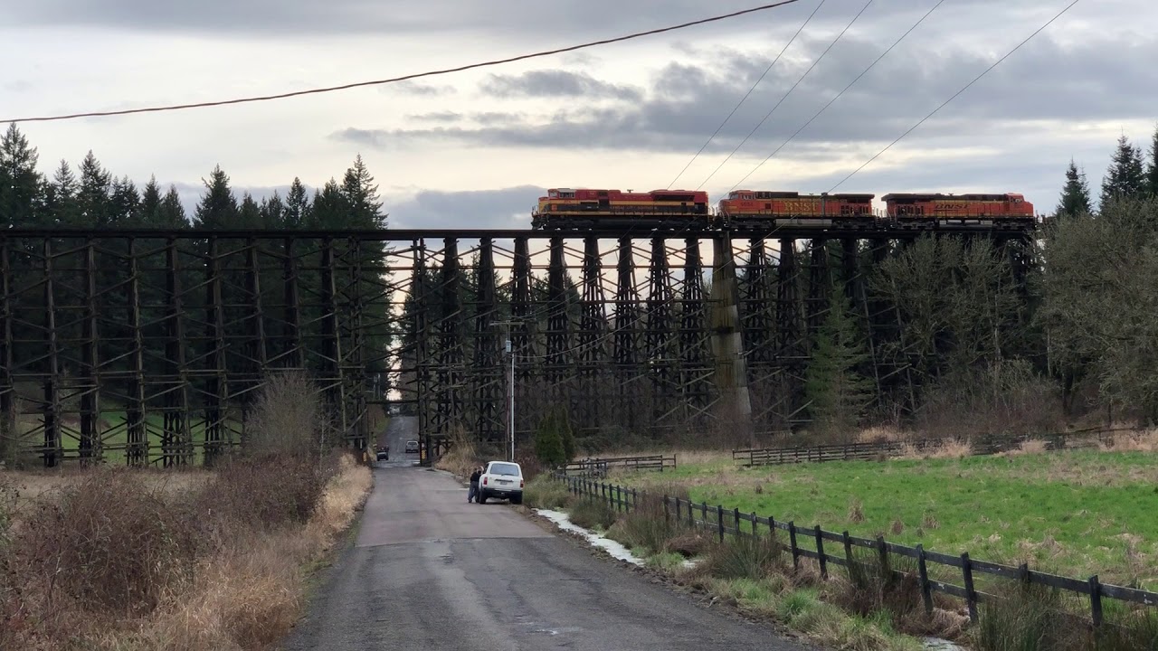 KCS 4174, BNSF 4684 and 7300 Cross Holcomb Creek Trestle - YouTube