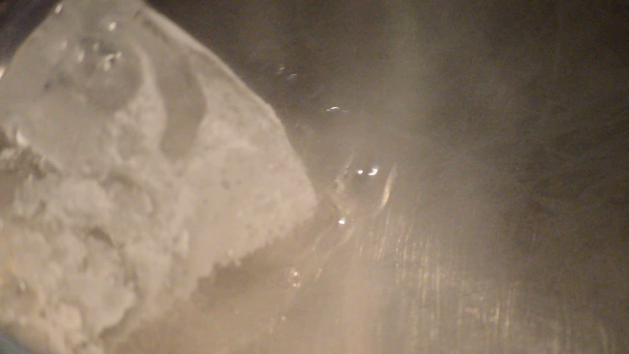Solid ice to liquid water - YouTube