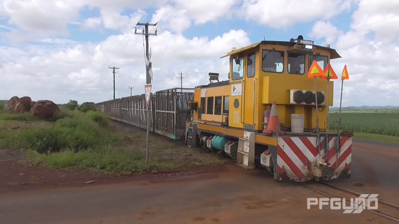 Cane Loco Hauling Through Crossing [HD] - YouTube