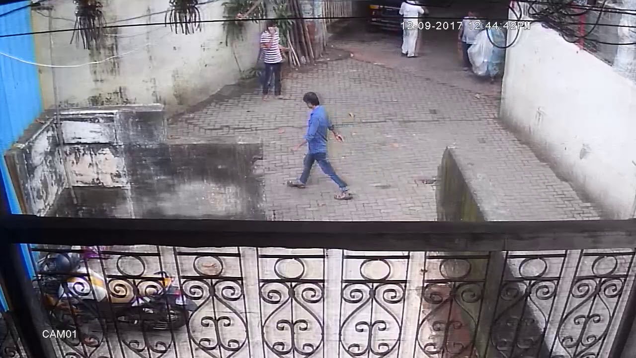 Woman urinating in the building compuond - YouTube