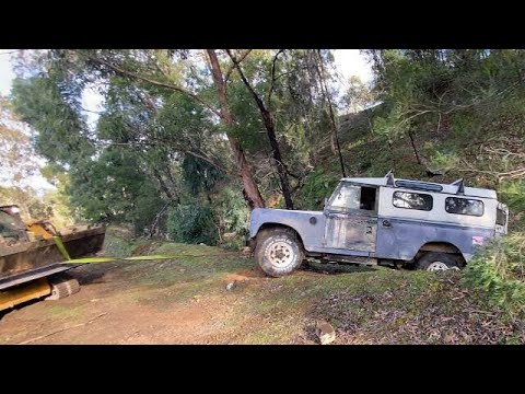 Recovering a Range Rover with a BobCat! - YouTube