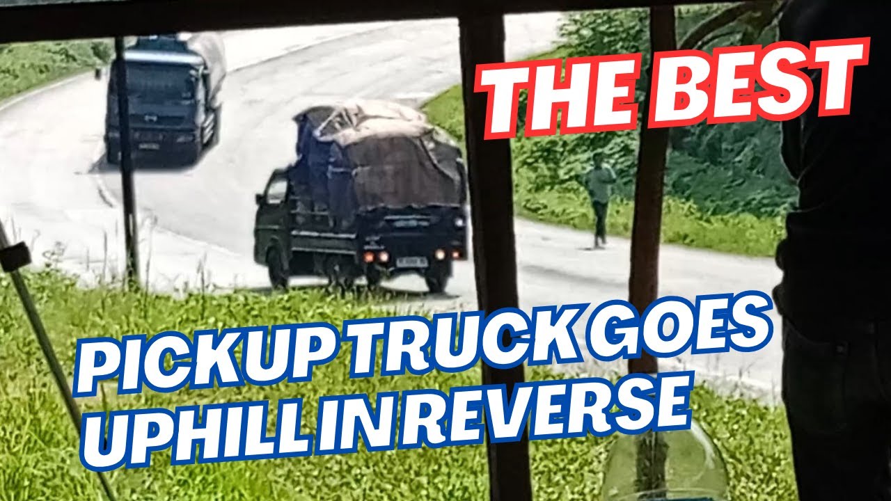 Pickup truck going backwards over the incline on Frog Hill - YouTube