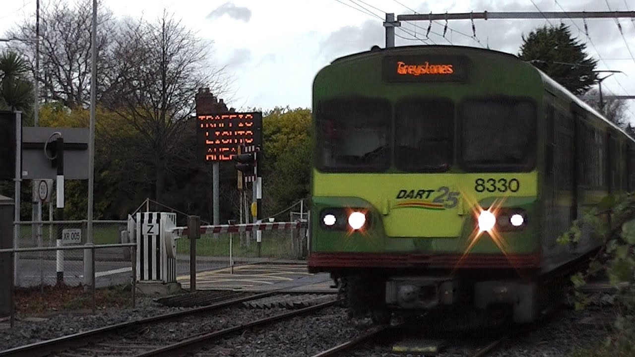 Dart Train number 8330 - Merrion Gates Level Crossing - YouTube