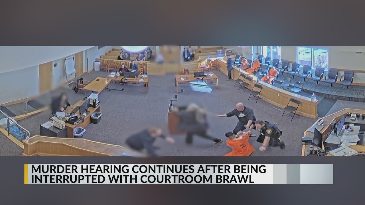 Hearing continues for murder suspect attacked in courtroom brawl - YouTube