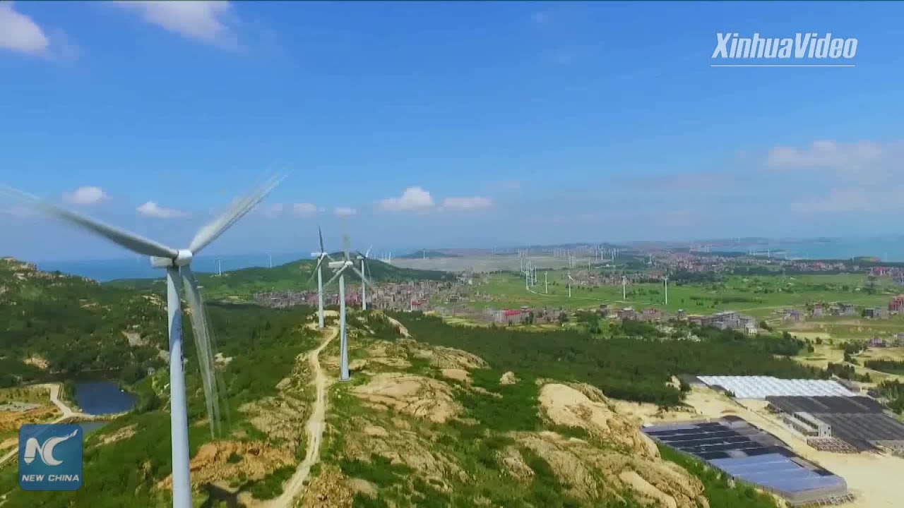 Amazing aerial view of wind farm in waters of Nanri Island, China - YouTube