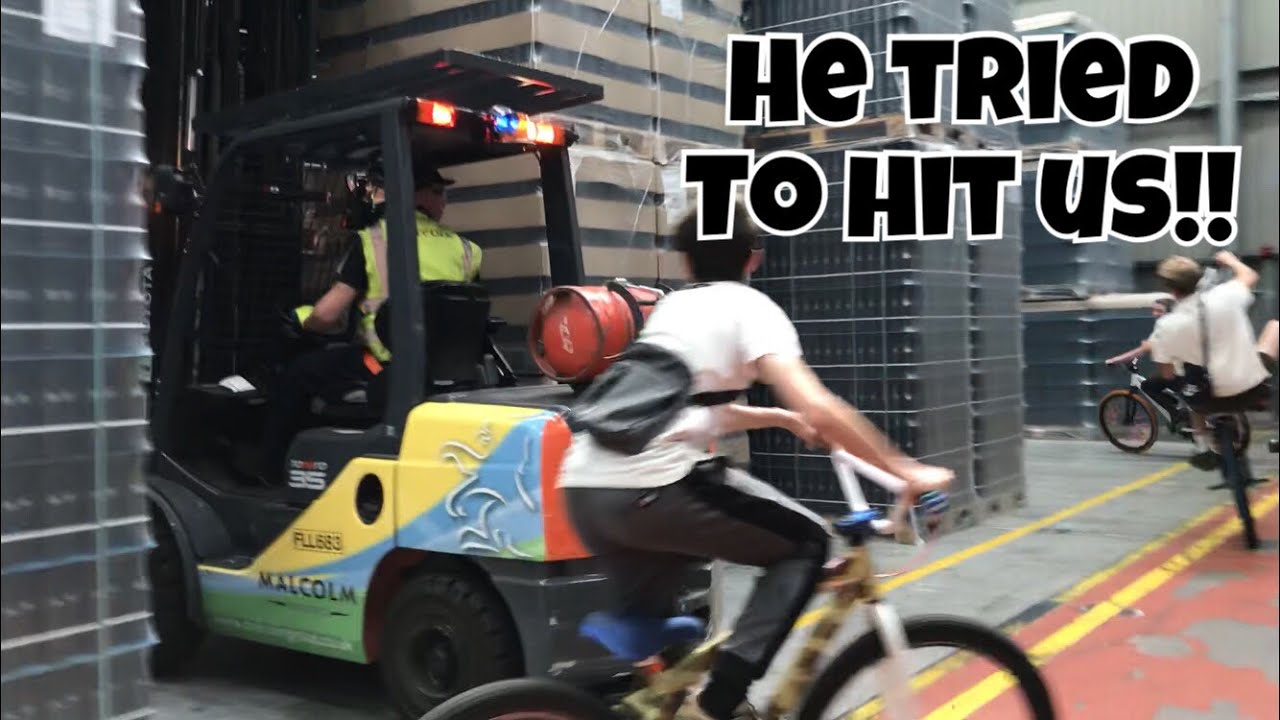 ANGRY FORKLIFT DRIVER CHASES KIDS ON BIKES!! - YouTube