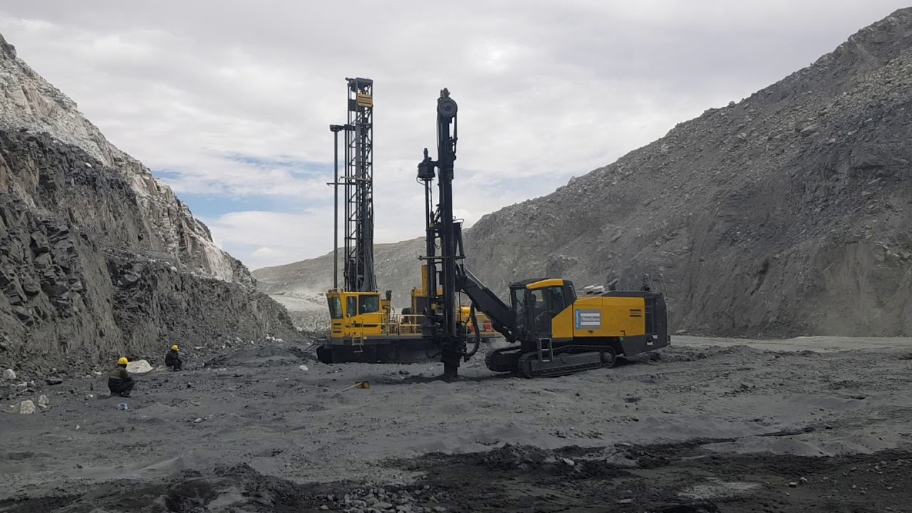 DML HP 1450 and D65 ATLAS COPCO in action - YouTube