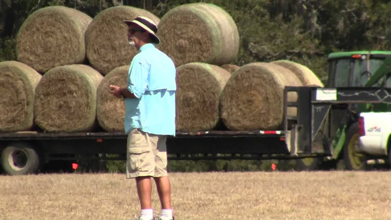 john deere tractor loading hay during the glider competition - YouTube