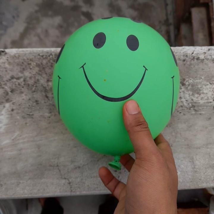 Experiment :Will a water balloon explode if it rolls down from a tall ...