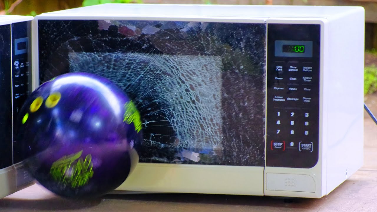 Homemaker Microwave vs. Bowling Ball - YouTube