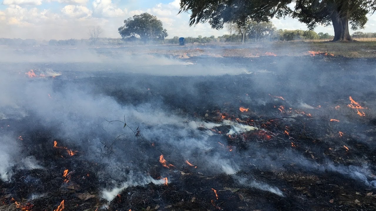 Burning off the hay field during a windsorm! 😱 - YouTube