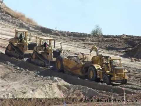 CAT 660B's being pushloaded - YouTube