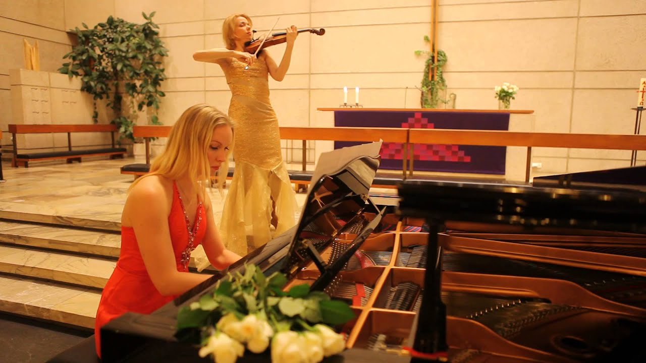 Mervi and Virva playing in Lauttasaari Church - YouTube