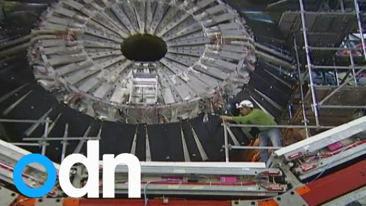 Atom smashing machine re-starts in dark matter bid - YouTube