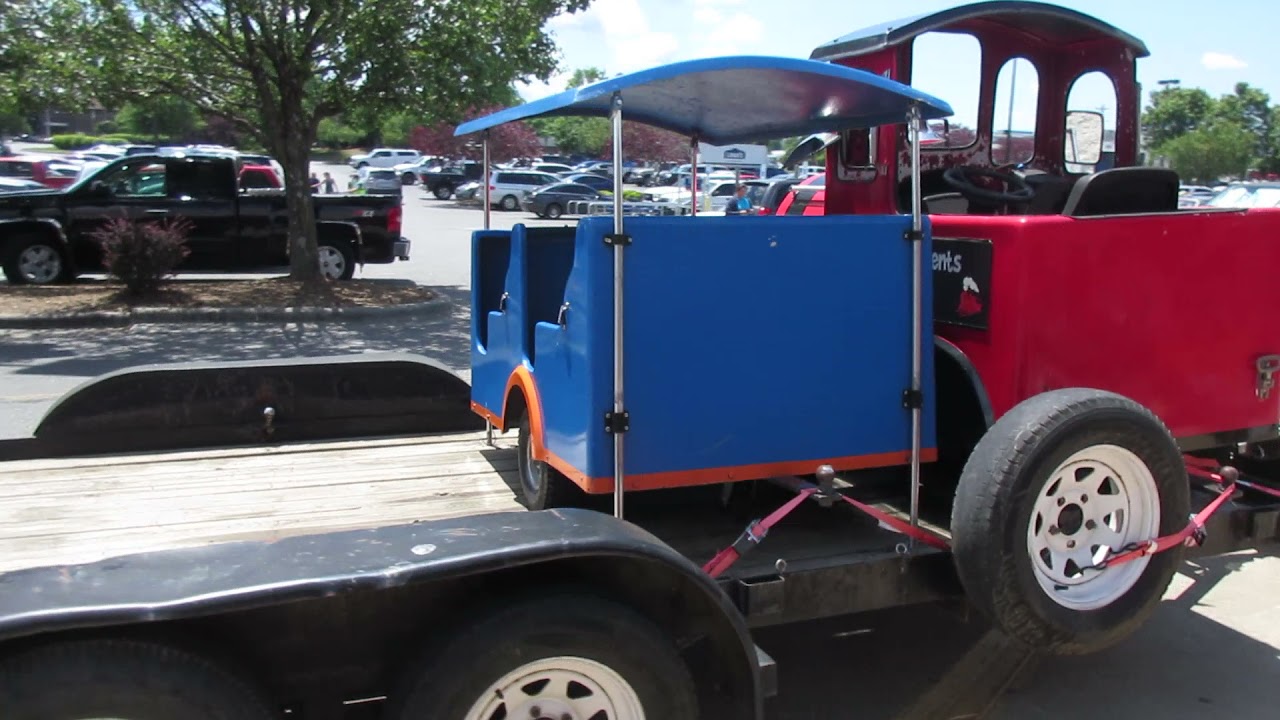 Lawn Mower Train On A Trailer Parked Beside The Lawn Mowers At Lowe's ...