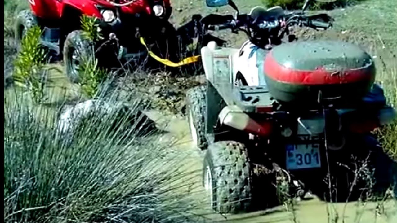 SYM 200 ATV stuck in mud!!!! - YouTube