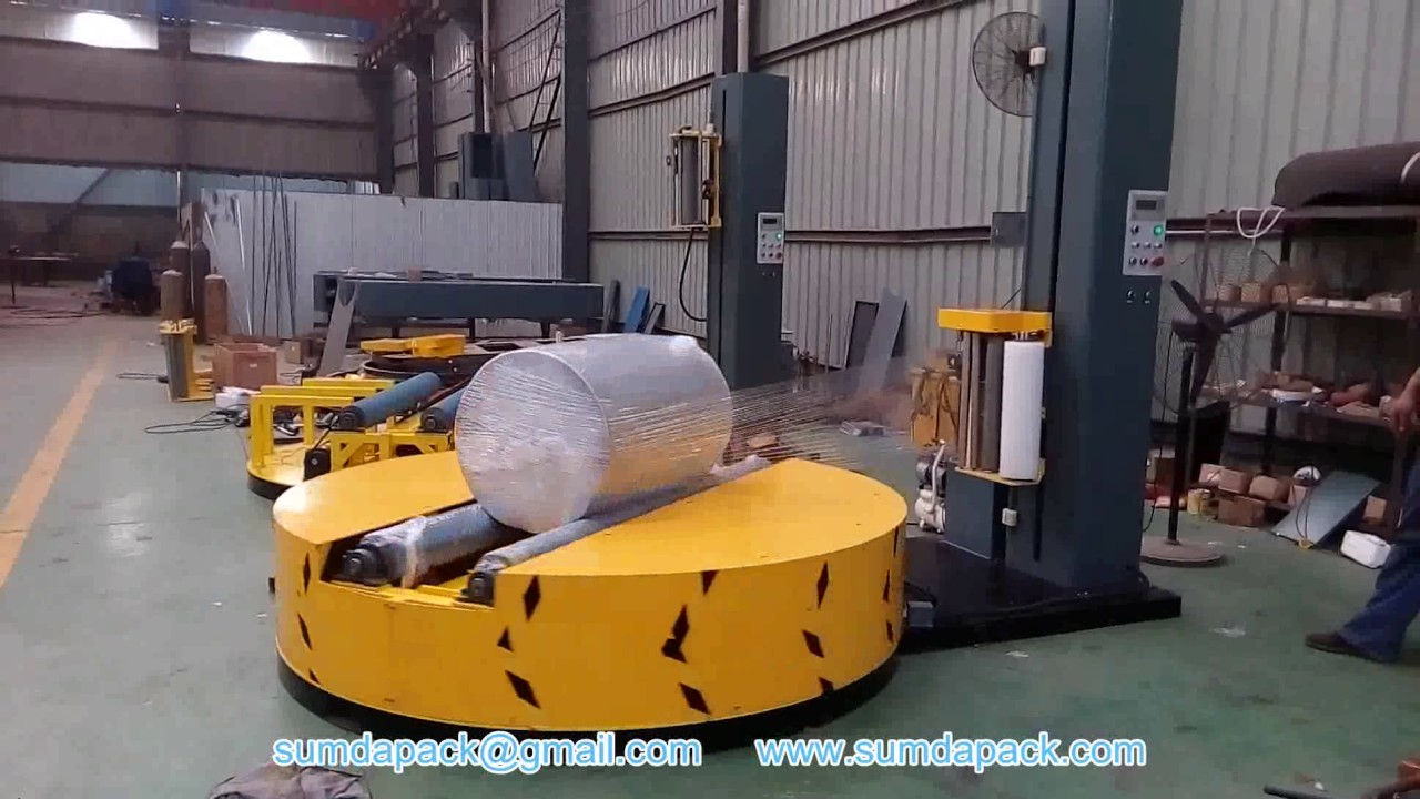 paper reel stretch wrapping machine - YouTube
