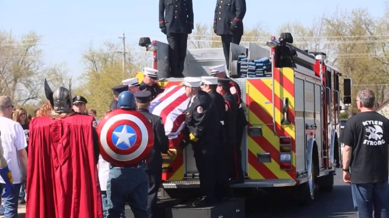 Superheroes carry 10-year-old boy's casket during funeral - YouTube