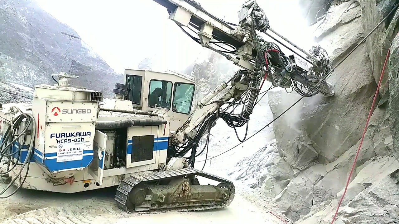 Mountain drilling machine working on the skardu road - YouTube