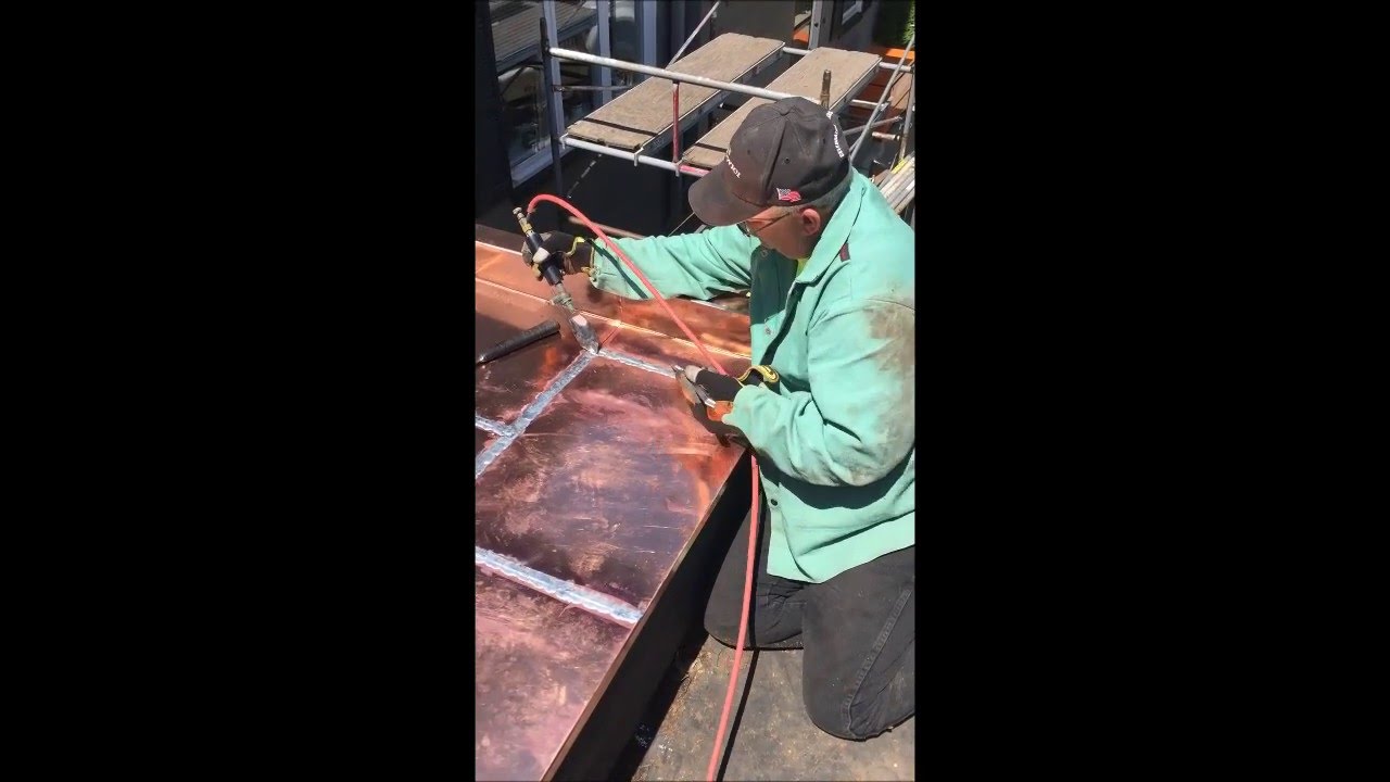 RickJohn Roofing - soldering flat lock panels - YouTube