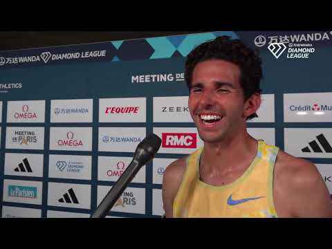 Grant Fisher talks after earning his first Diamond League victory in Paris 5000