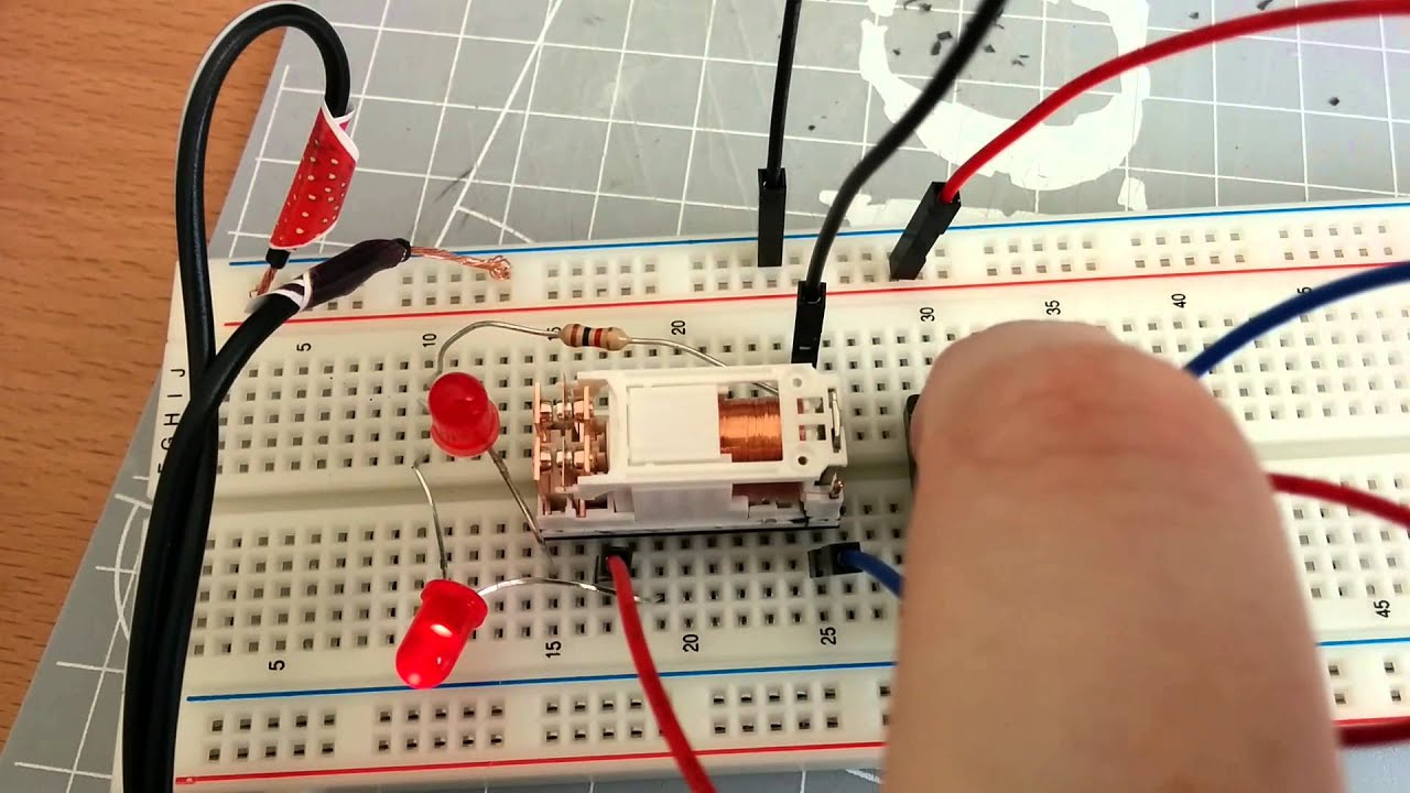 Tiny circuit with a relay and two LEDs - YouTube