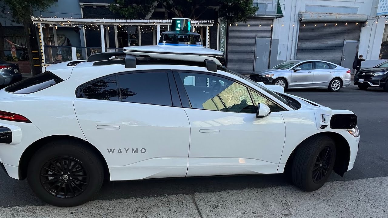 Driverless Car in San Francisco waiting for passengers #waymo #jaguar # ...