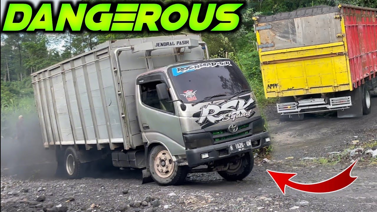 Heavy Load and Sloping Road Toyota Dyna truck loaded with Merapi ...