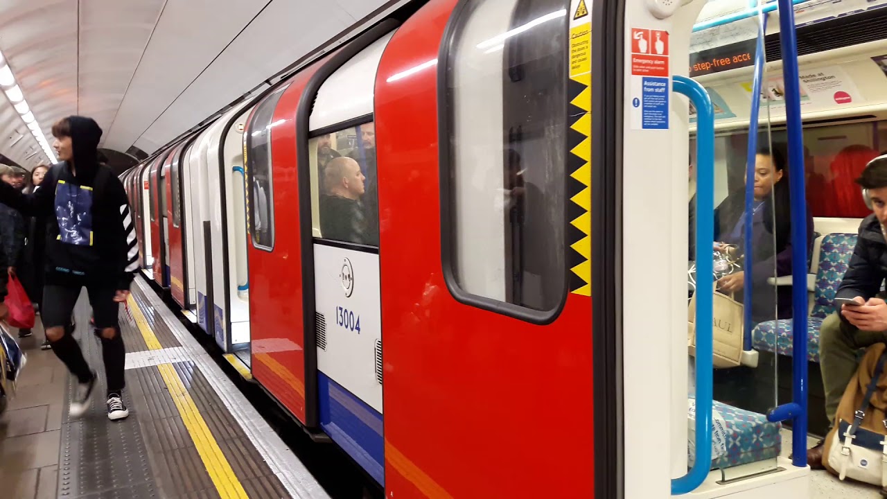 London Underground Victoria Line: 2009 Tube Stock #23004 arriving at ...