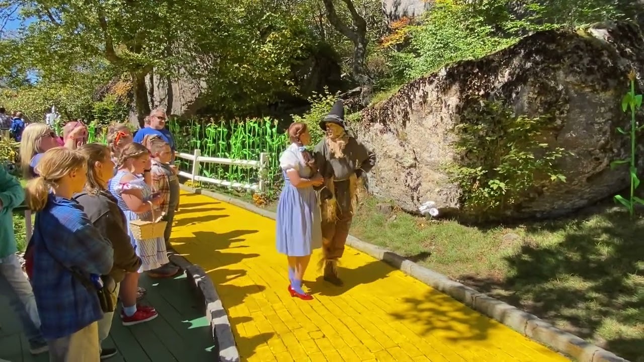 Dorothy meets the Scarecrow along the Yellow Brick Road at Land of Oz ...