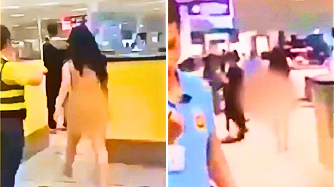 Woman struts without clothes through airport in wild scene - YouTube