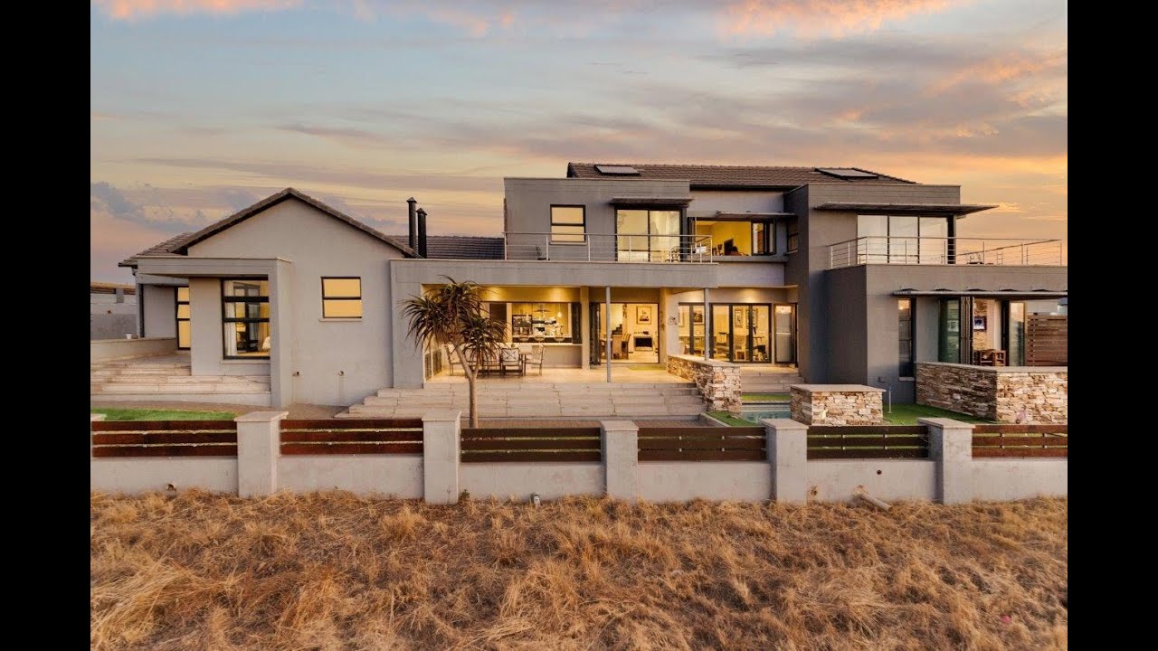 MODERN DESIGNER HOME WITH INCREDIBLE VIEWS IN COPPERLEAF GOLF ESTATE ...