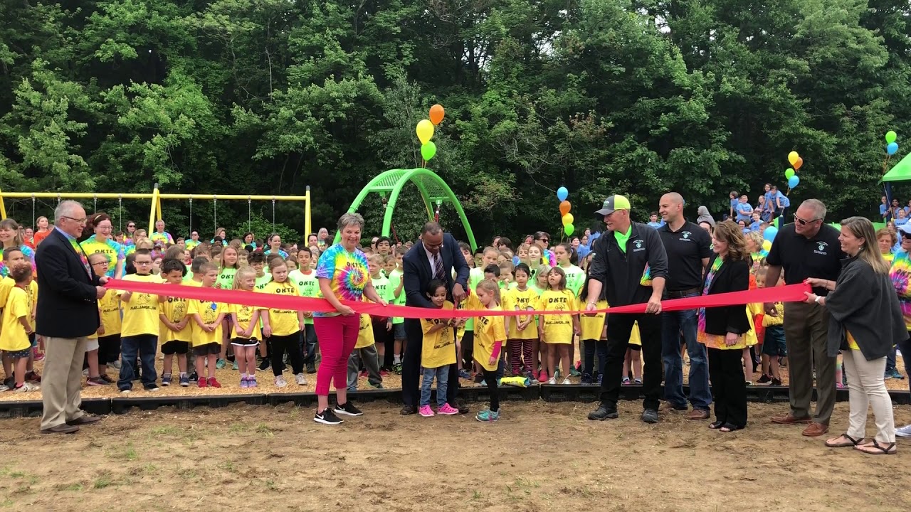 Okte's New Playground Ribbon Cutting Ceremony - YouTube