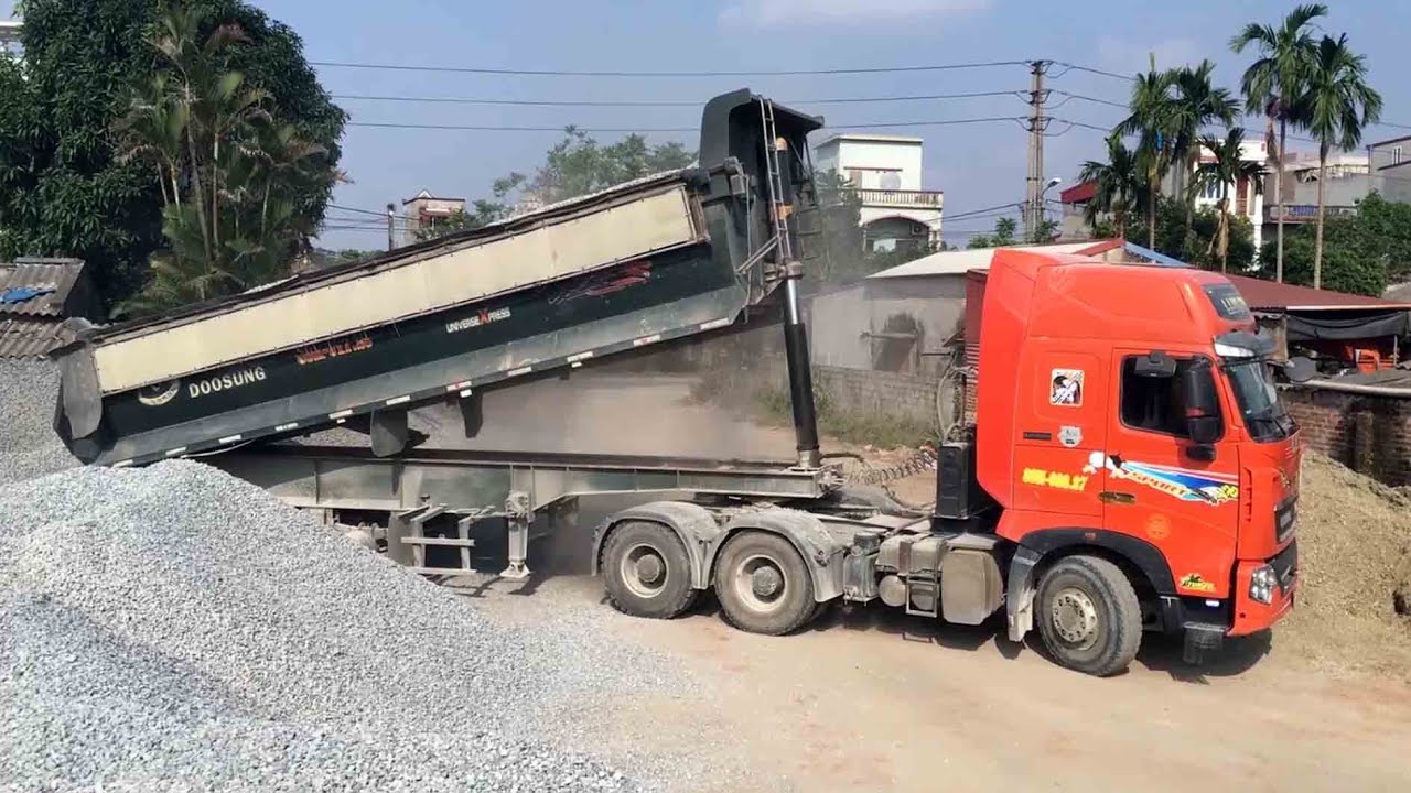 Groundbreaking for expansion project, excavator, road roller, dump ...