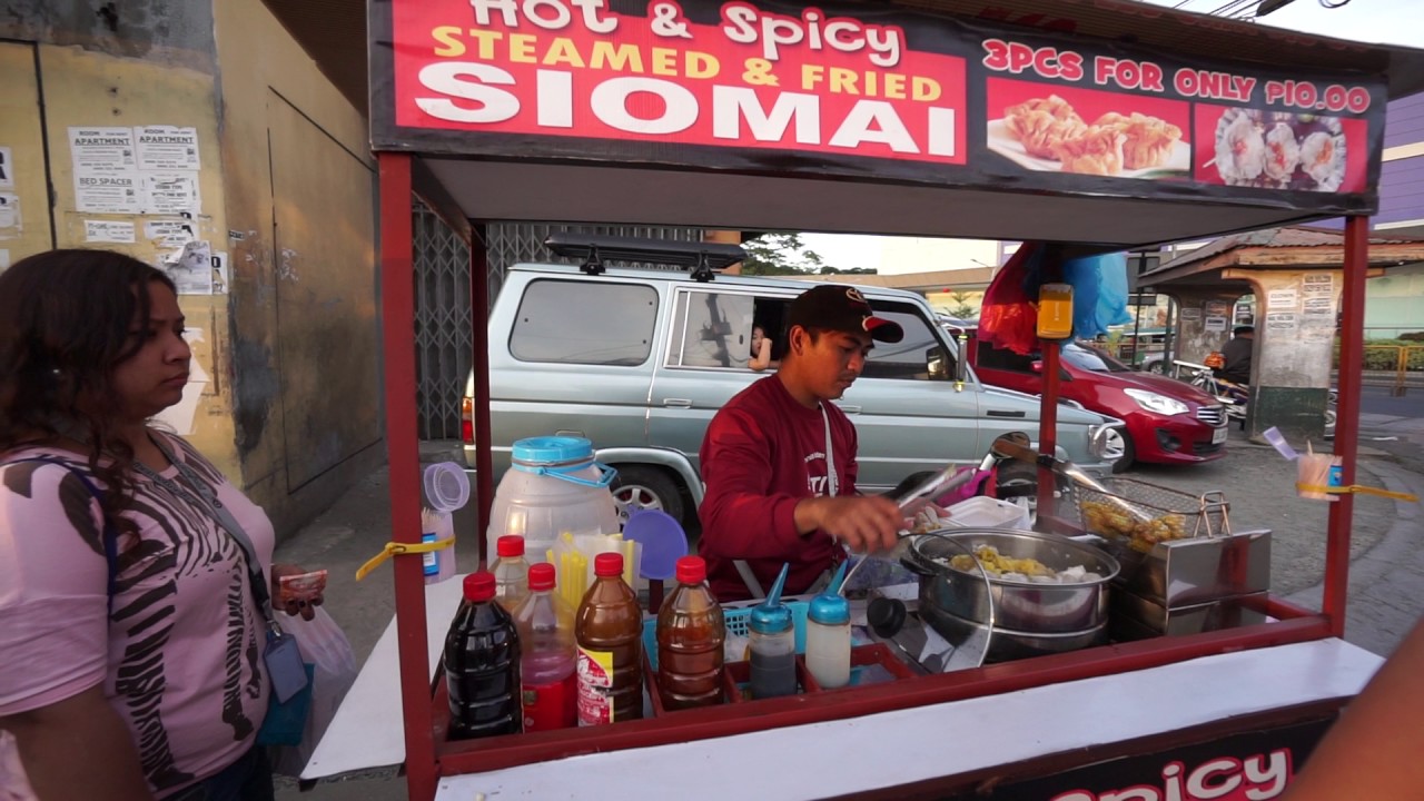 Philippines, street food, buying Siomai outside SM City San Jose Del ...
