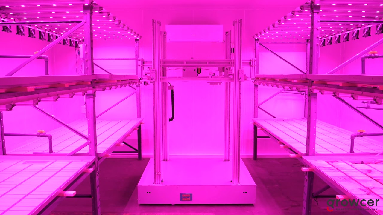 Growcer's Autonomous Lift moving plant carriers - YouTube