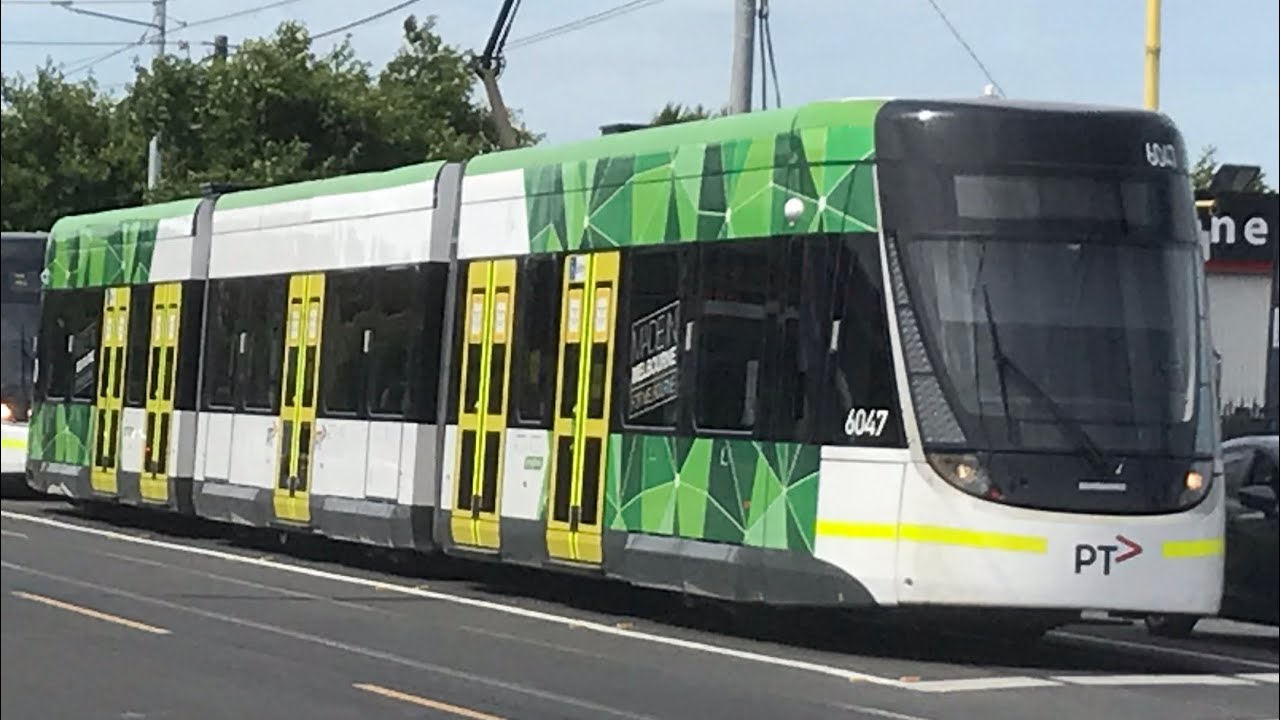 A ride on E1 class tram #6006 on Route 11 towards Victoria Harbour ...