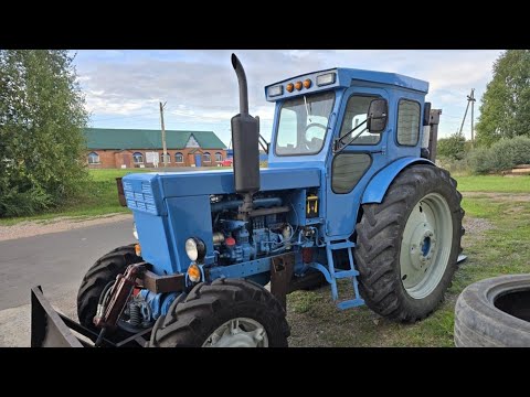 Восстановленный трактор Т-40 с ножом и подъёмником.