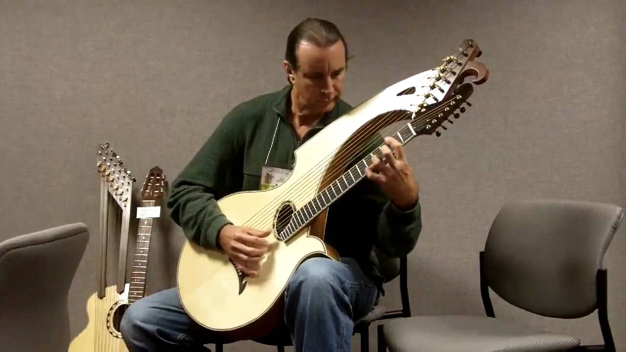 andy play my harp guitar! - YouTube