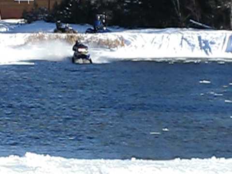 Snowmobiling over open water - YouTube
