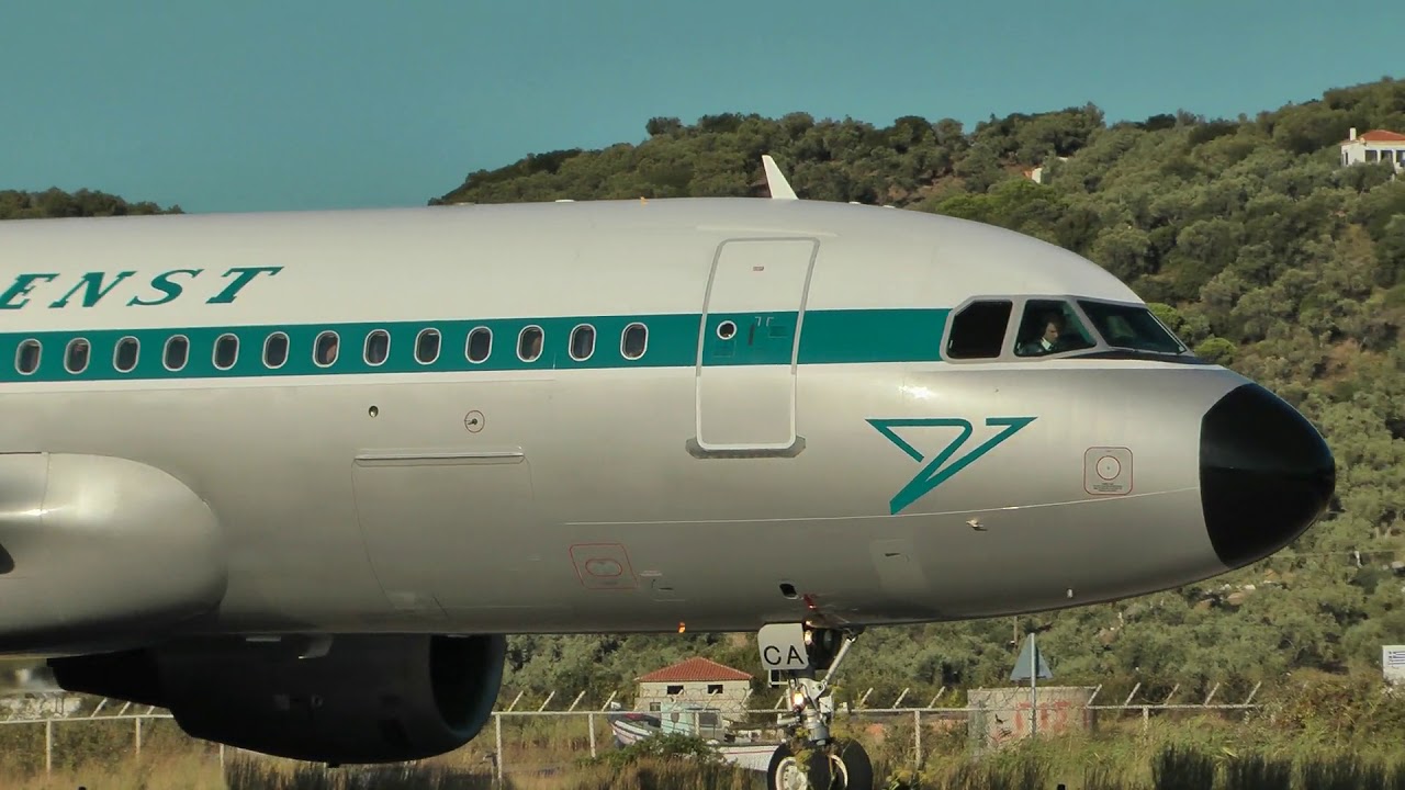 Condor ( Retro livery ) Airbus A320 with pilote wave @ Skiathos Airport ...